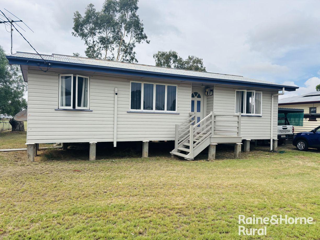 Charming 3 bedroom family home - 54 Rugby Street, Mitchell, QLD 4465 ...