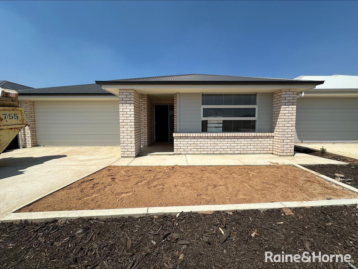 Spacious 4-Bedroom Family Home in Munno Para Downs - 85 Hatcher Road ...